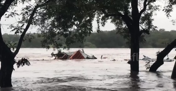 Raging floodwaters carry entire house downstream as severe flooding ...