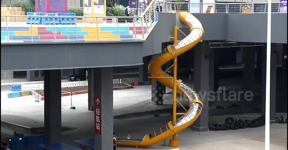 32-foot-high spiral slide has been built at Chongqing train station ...