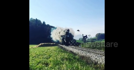 Crazy train! Incredible moment man does loco flip over moving ...