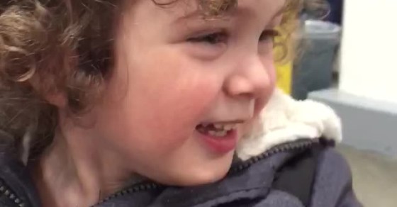 Happy Young Boy Saying Hello to Fellow Shoppers - Sharedots