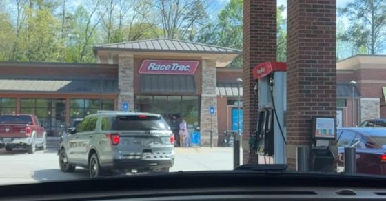 Police Car Drives Off With Gas Pump - Sharedots
