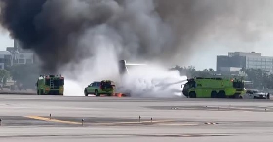 Emergency Crews Work to Extinguish Fire at Airport - Sharedots