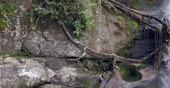 Cliff Jumping Man Loses Traction and Slips off Edge Landing on Rocks ...