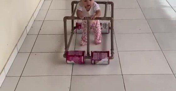 Baby Takes a Stroll in Homemade Walker - Sharedots
