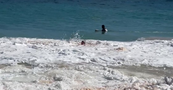 Man Gets Twice Slammed By Ocean Waves - Sharedots