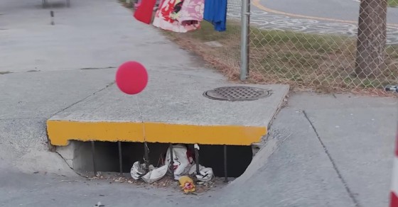 Clown in a Street Drain - Sharedots