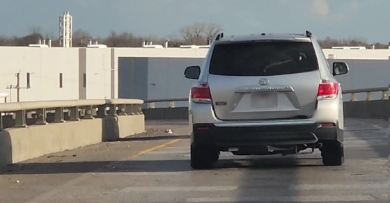 Wrecked Car Driving Off Ramp With Hood Up - Sharedots